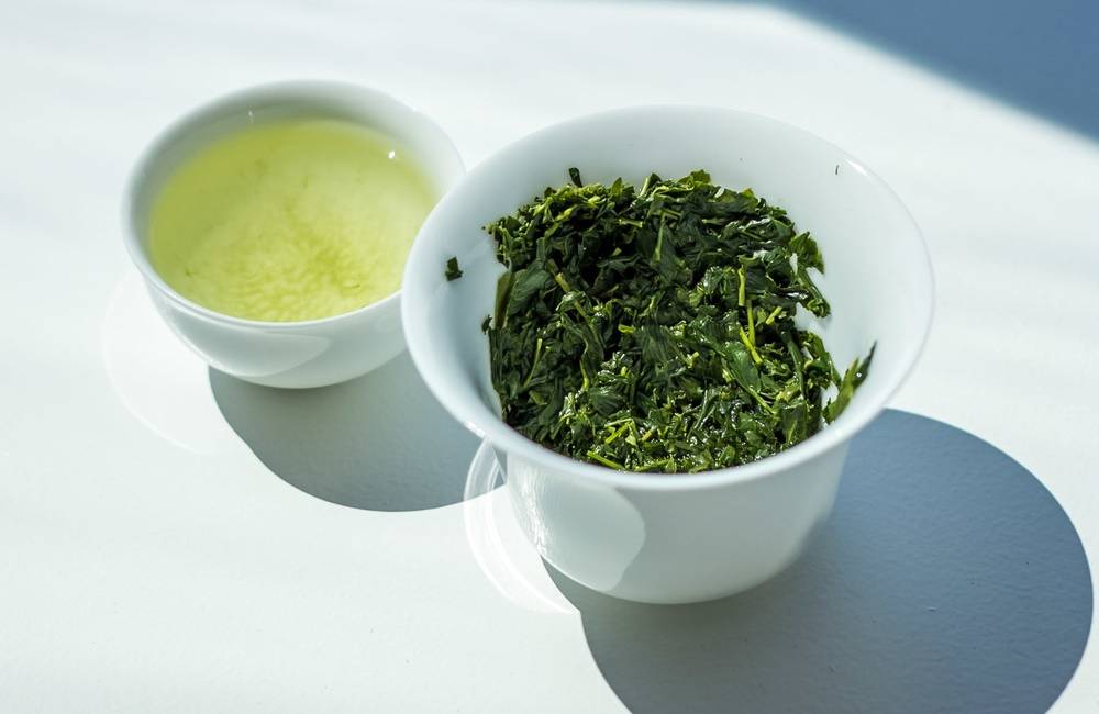 Why does green tea have a weird aftertaste?