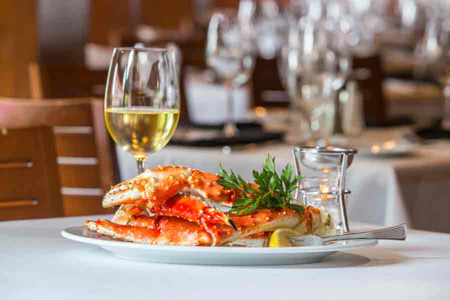 Why does white wine go well with seafood?