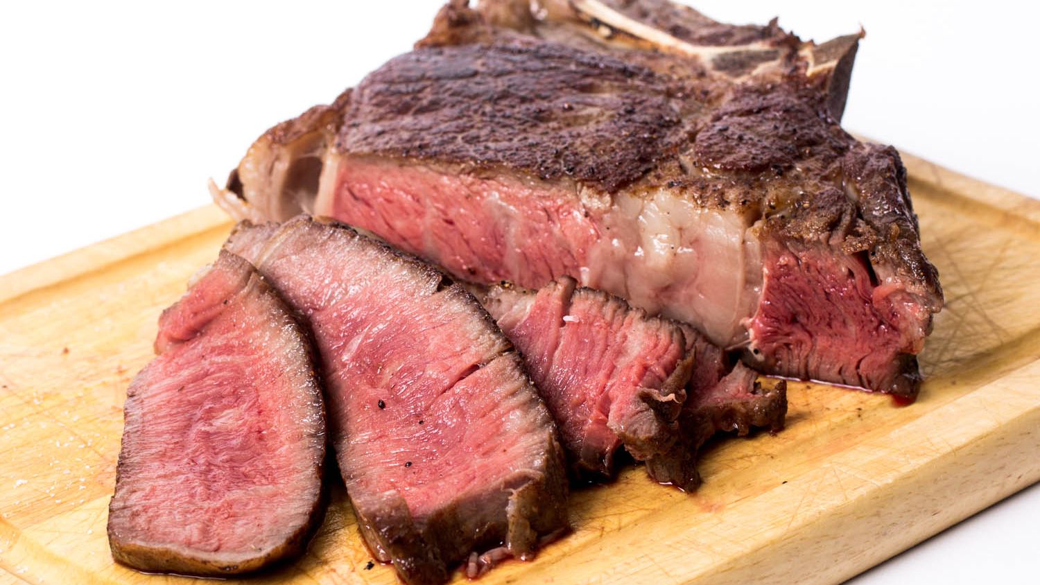 Why is cooked meat more juicy than raw?