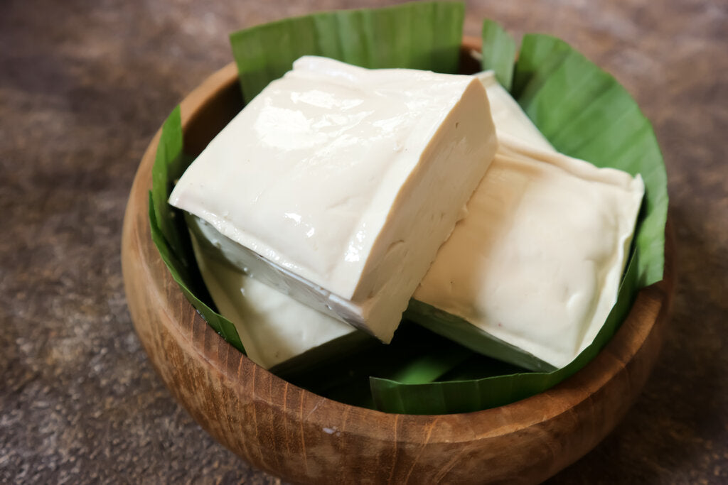 Why is gypsum added to tofu?