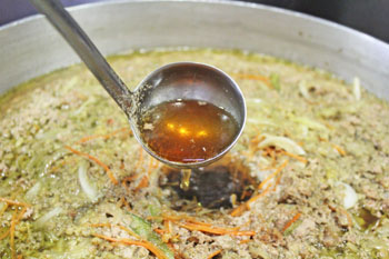 Why is it important not to boil consommé during clarification?