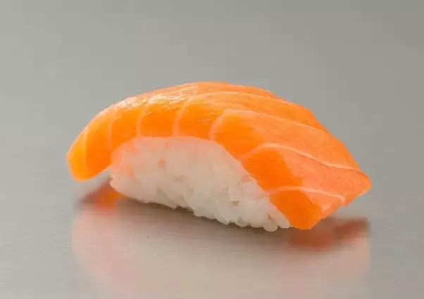 Why is salmon not cooked in sushi?