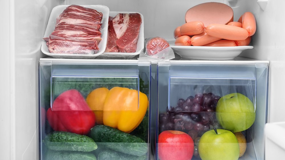 Why should you cover raw meat in the fridge?