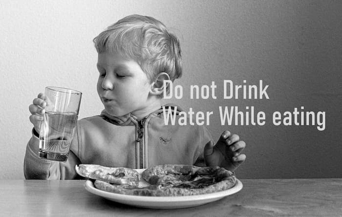 Why should you not drink water while eating?