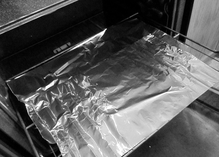 Why should you not line your oven with foil?