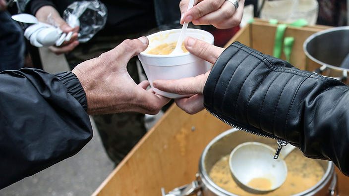 Why was soup a popular meal to feed the hungry and homeless?