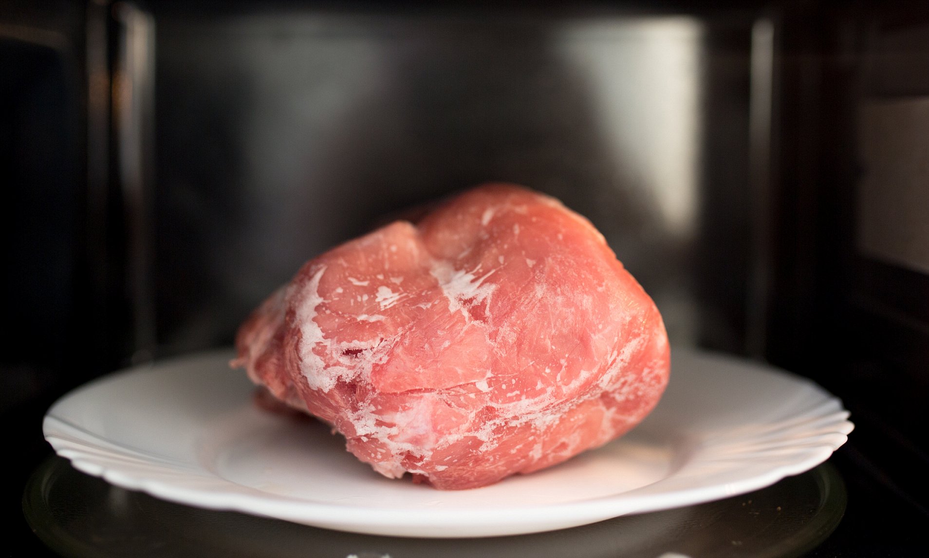 Why You Should Never defrost meat in the microwave?